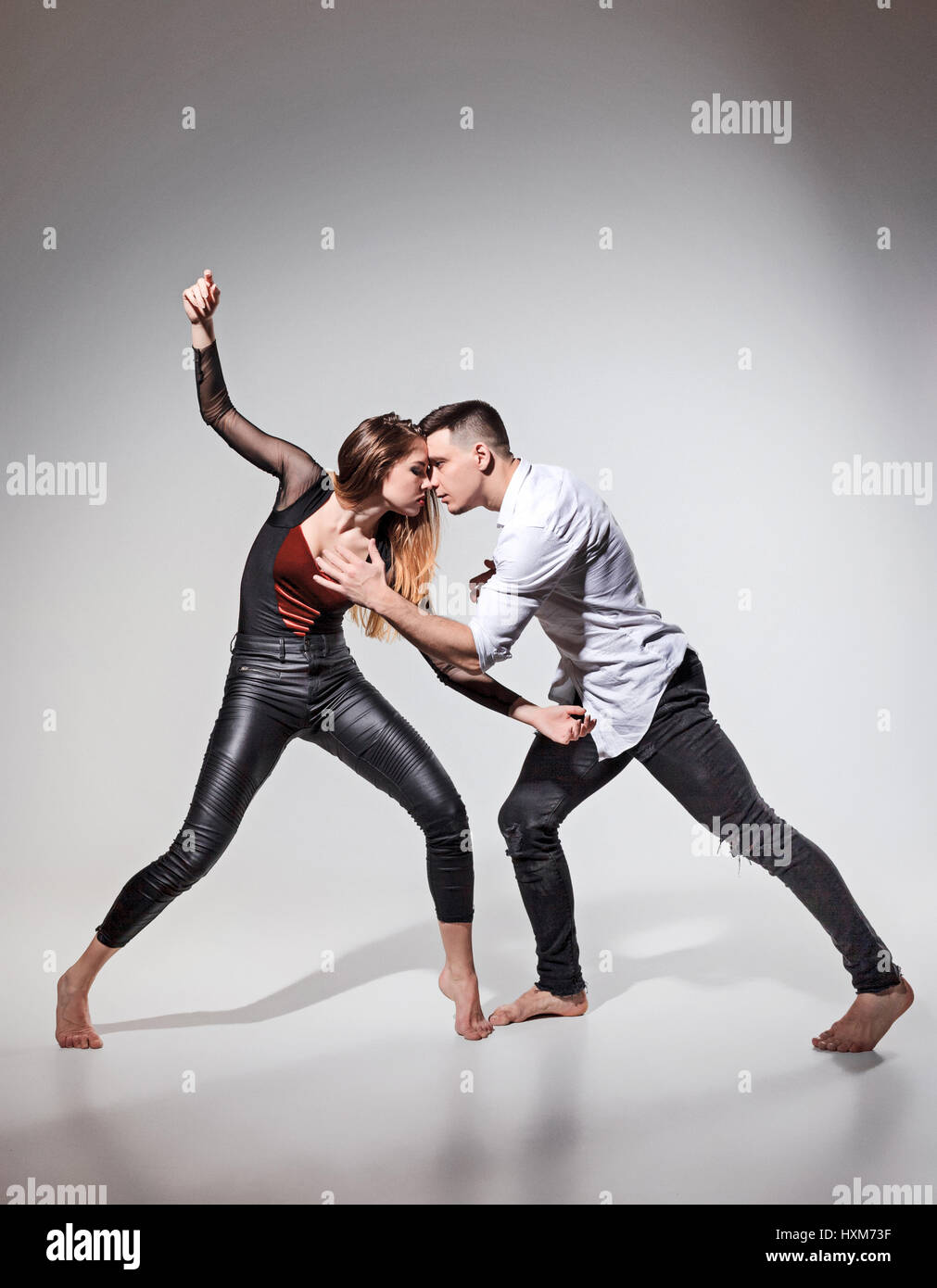 Two people dancing in contemporary stile Stock Photo - Alamy