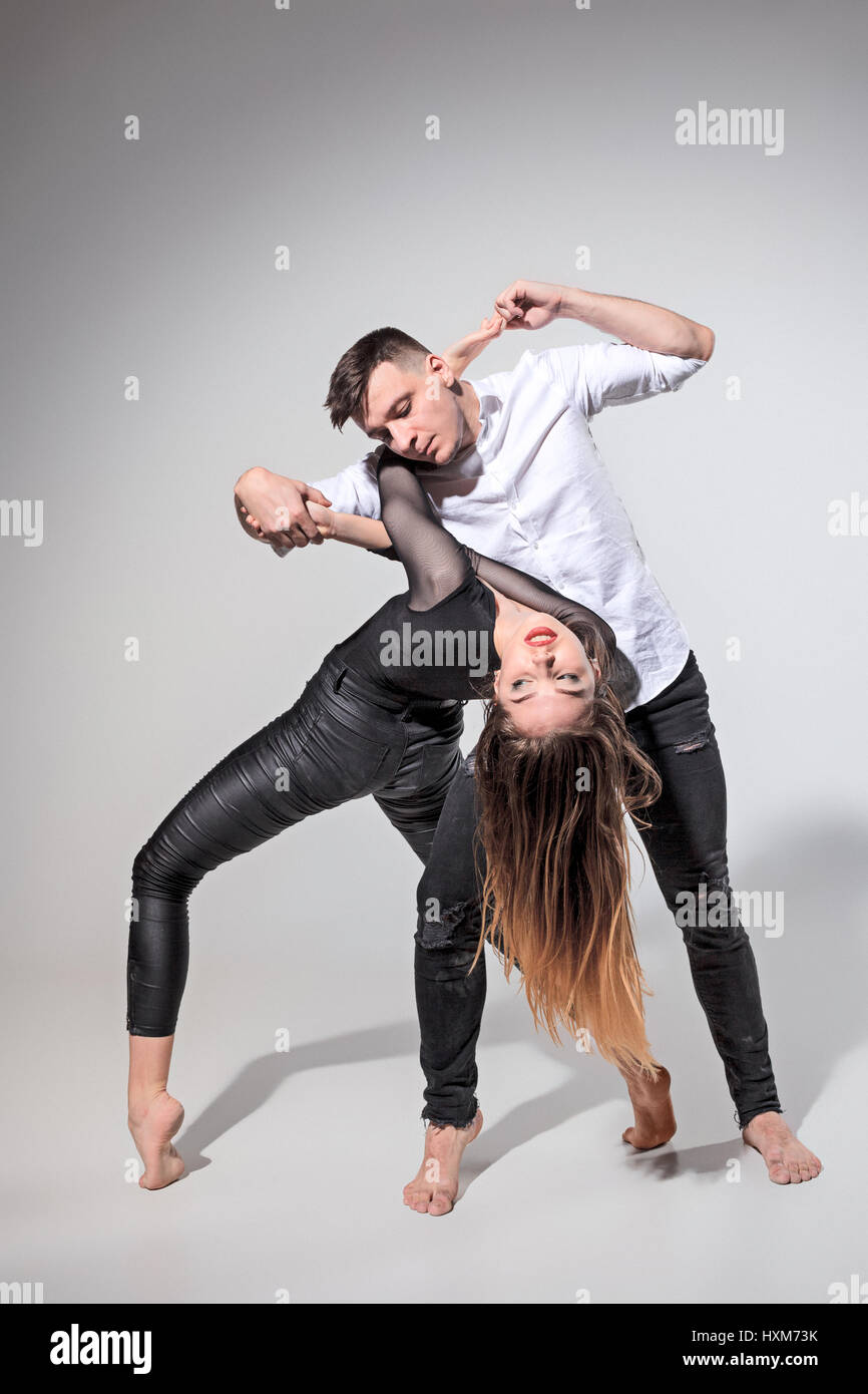Two people dancing in contemporary stile Stock Photo - Alamy