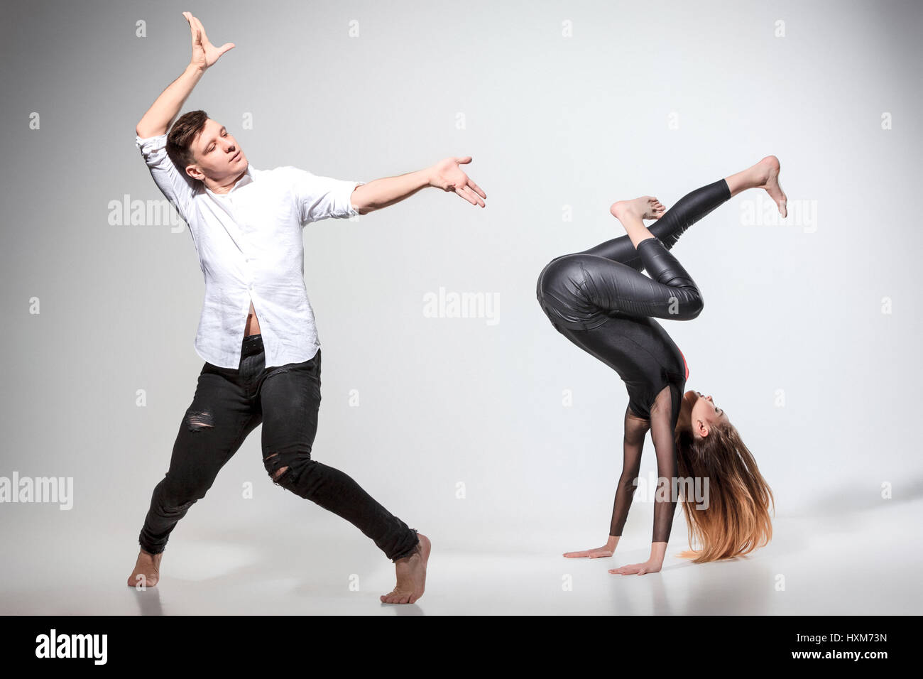 Two people dancing in contemporary stile Stock Photo - Alamy