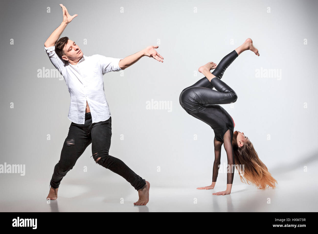 Two people dancing in contemporary stile Stock Photo - Alamy