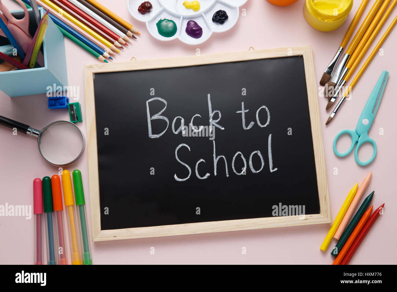 Watercolour palette with blackboard Stock Photo - Alamy