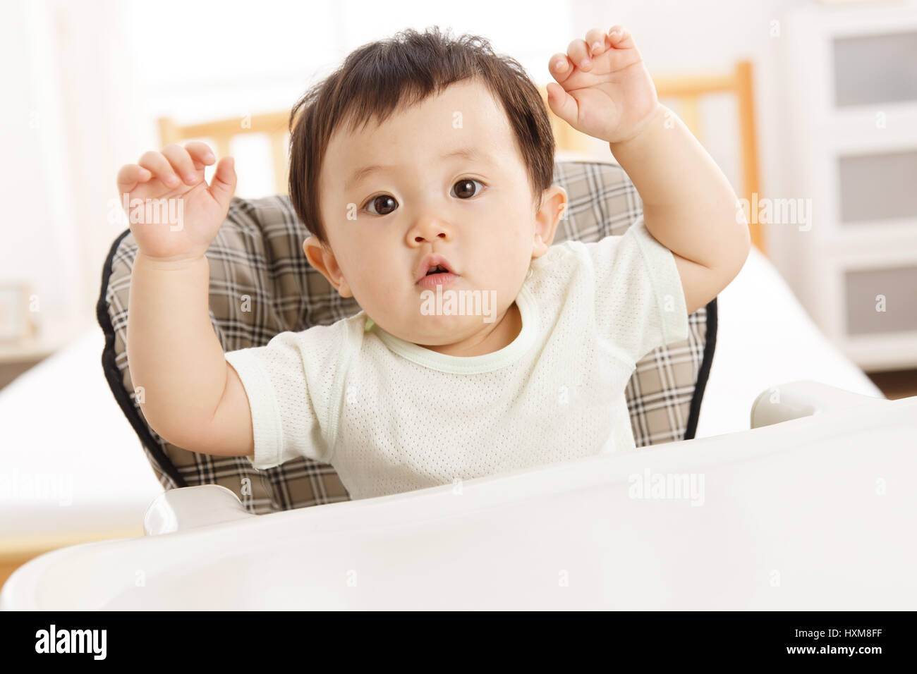 Baby high up in arms hi-res stock photography and images - Alamy