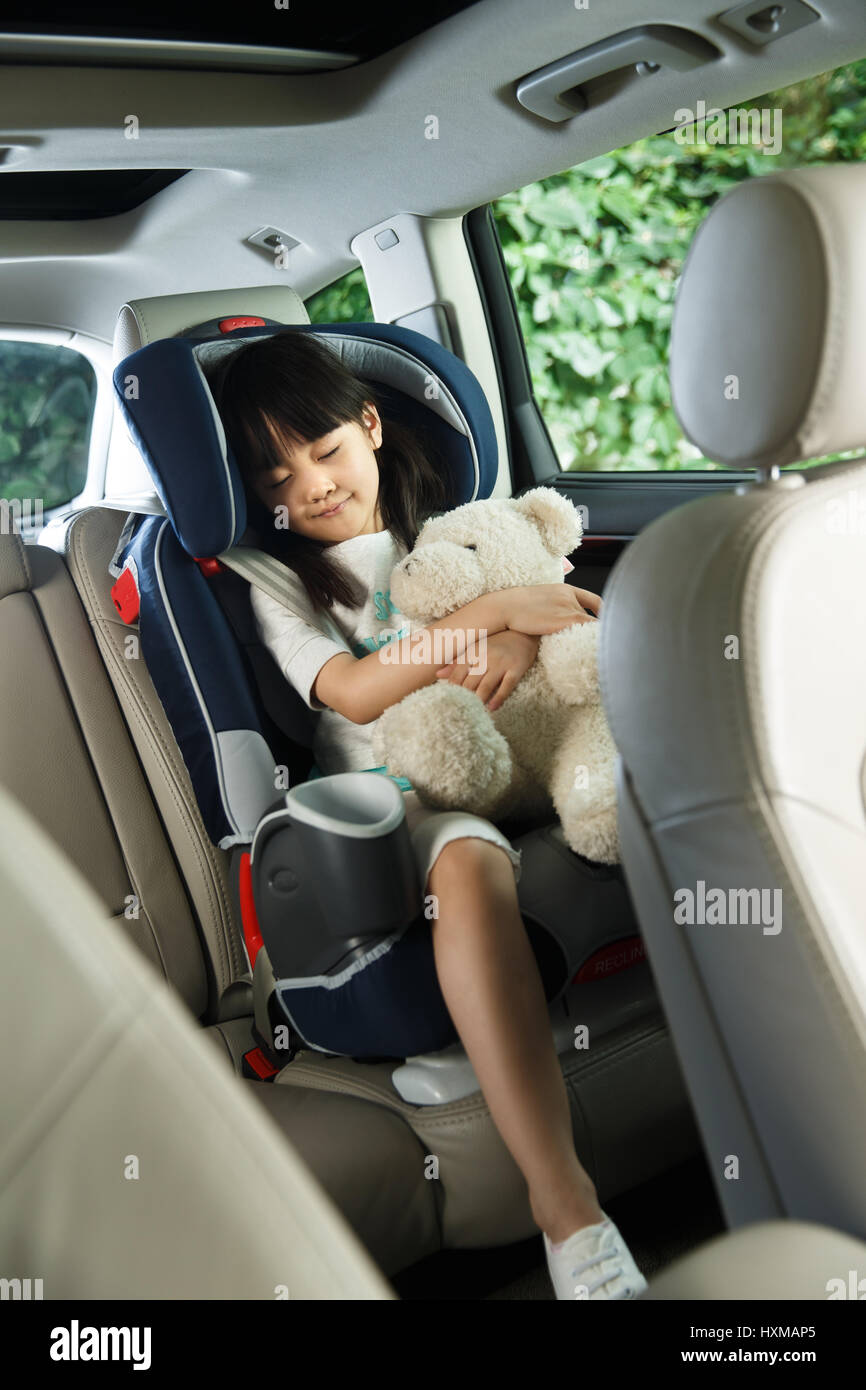 Girl sleeping back seat car hi-res stock photography and images - Alamy