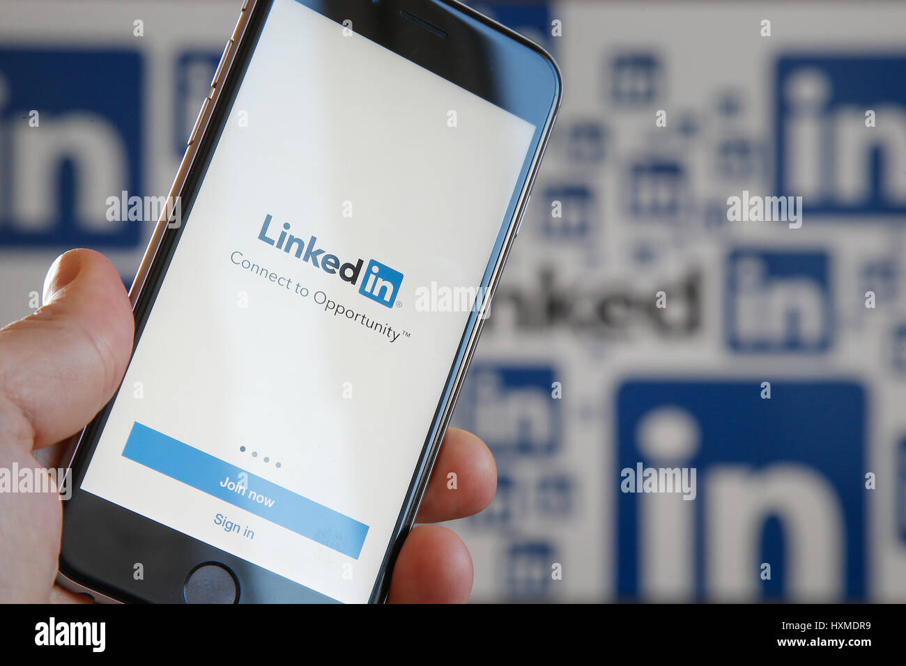 The LinkedIn social network for professionals app and logo is seen on ...