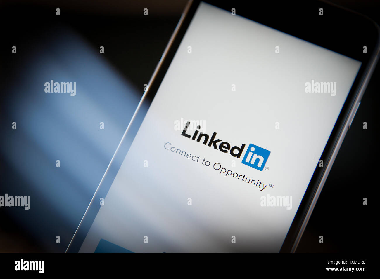 The LinkedIn social network for professionals app and logo is seen on ...