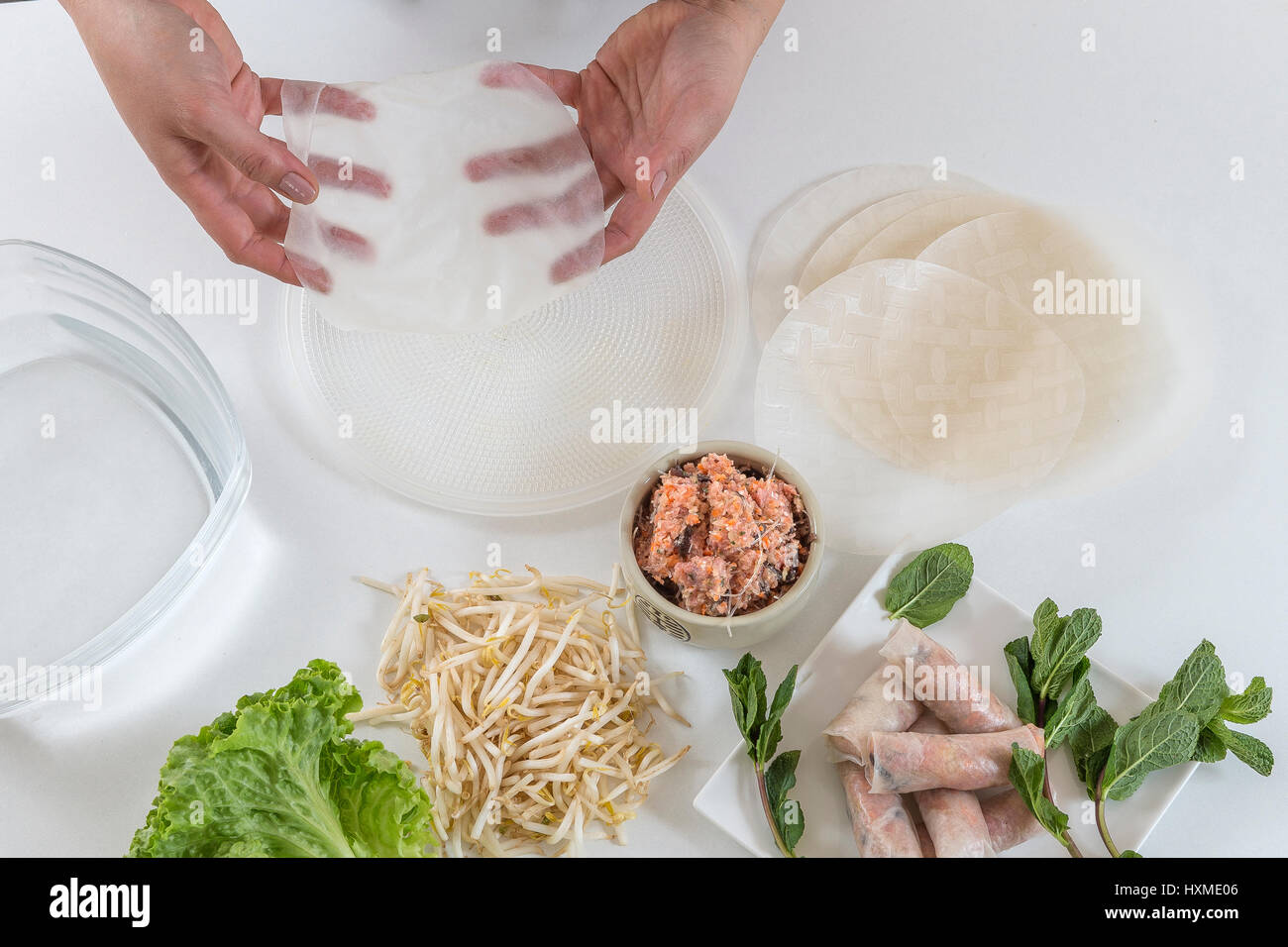 Hands preparing homemade dim-sum asian dumplings buns Stock Photo - Alamy