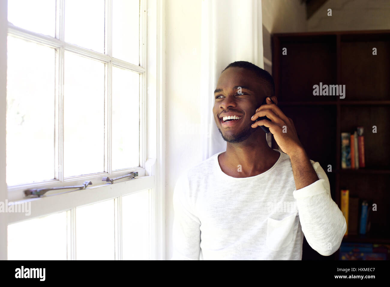Black guy making phone call hi-res stock photography and images - Alamy