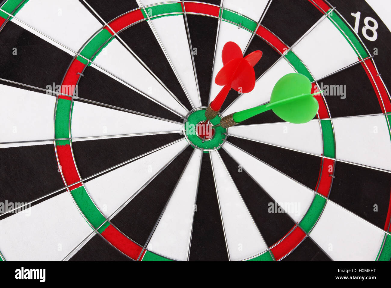 dartboard with two darts closeup Stock Photo - Alamy