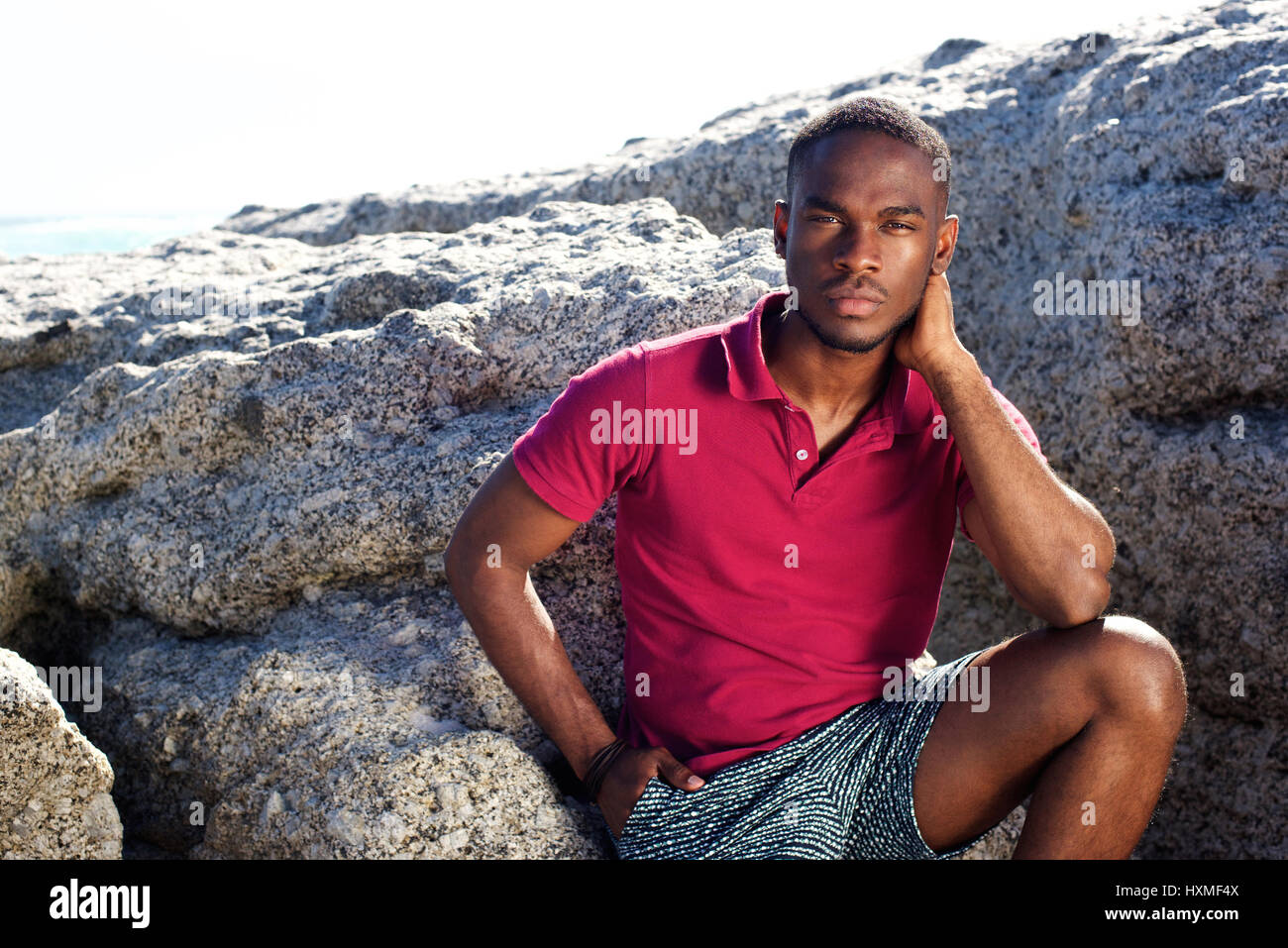 African male posing at the beach hi-res stock photography and images ...