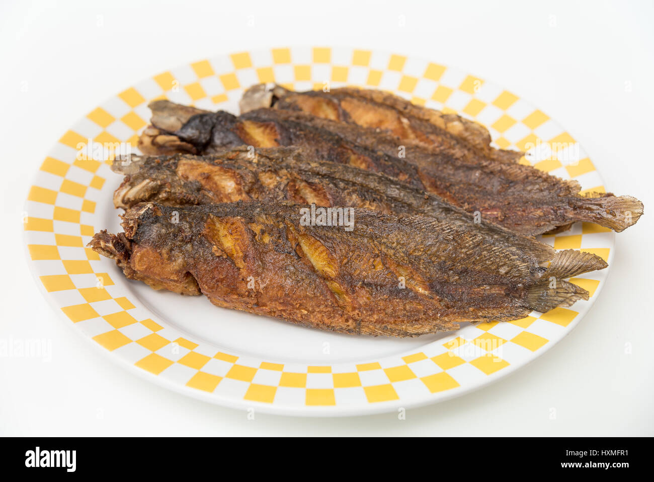 Deep fried catfish, Isolated on white background Stock Photo - Alamy