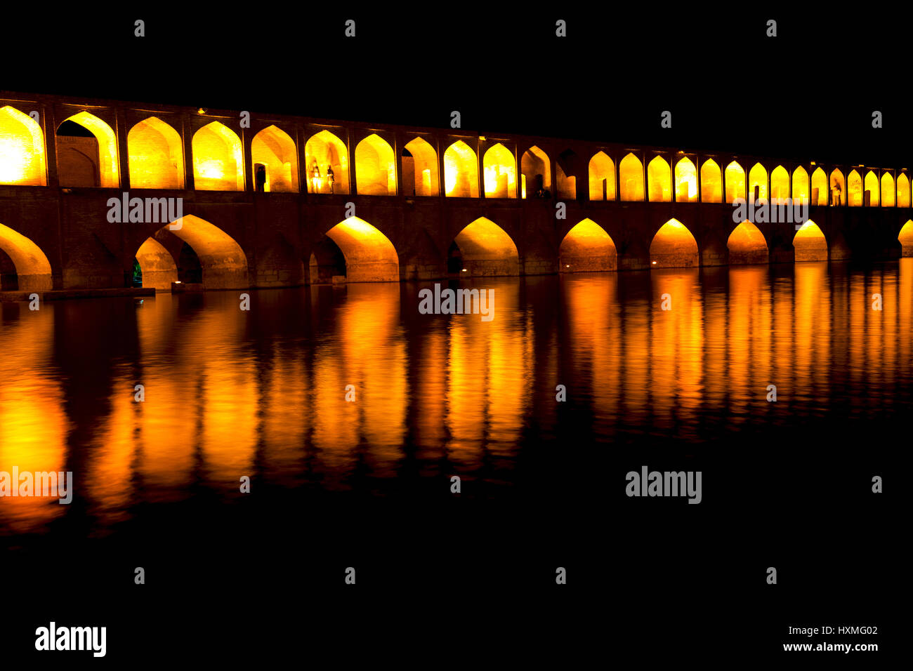 in iran the old bridge of isfahan for light and night Stock Photo - Alamy