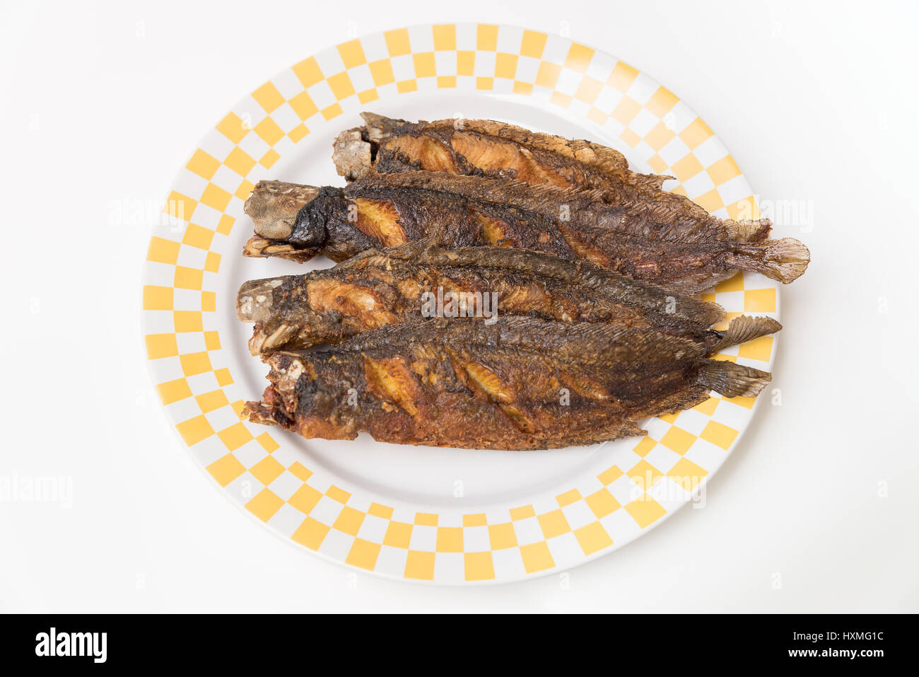 Deep fried catfish, Isolated on white background Stock Photo - Alamy