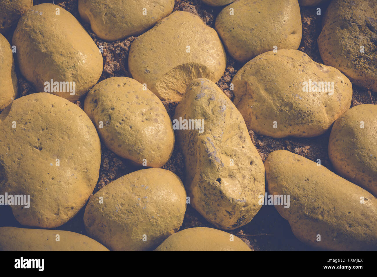 yellow stones pattern Stock Photo - Alamy