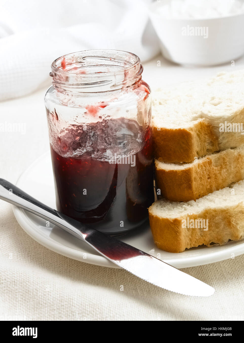 Jam on breakfast table Stock Photo - Alamy