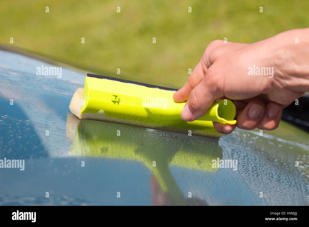 Human hand cleaning window Stock Photo - Alamy