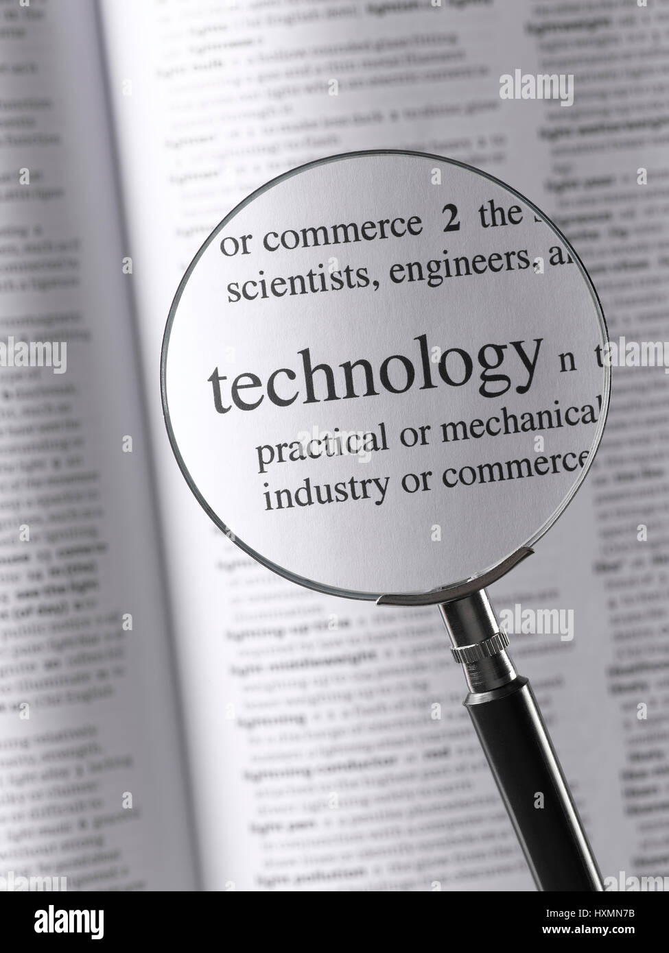 Magnifying Glass Highlighting Technology Stock Photo - Alamy