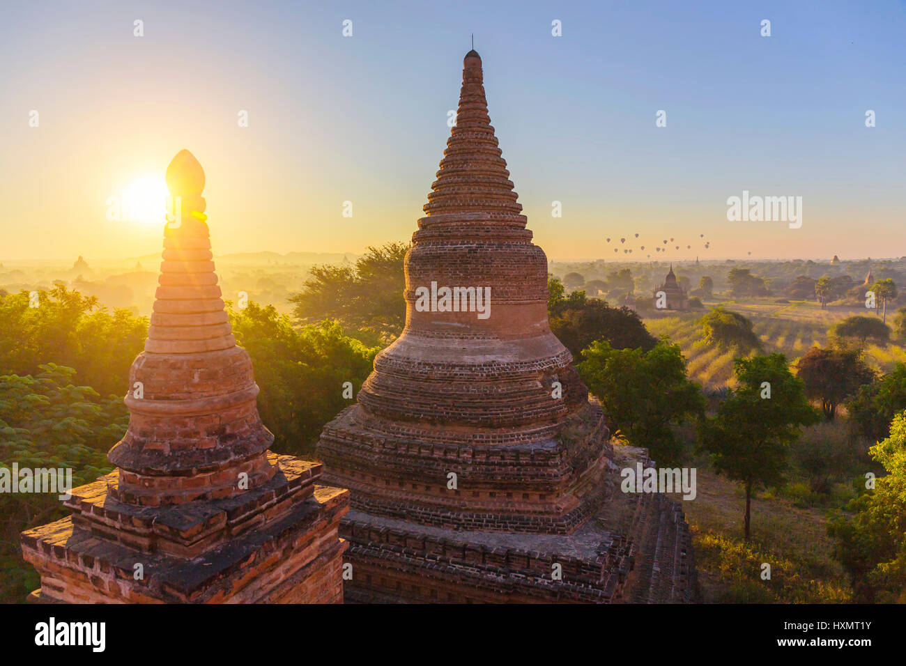 Scenic view of ancient Bagan temple during golden hour Stock Photo - Alamy