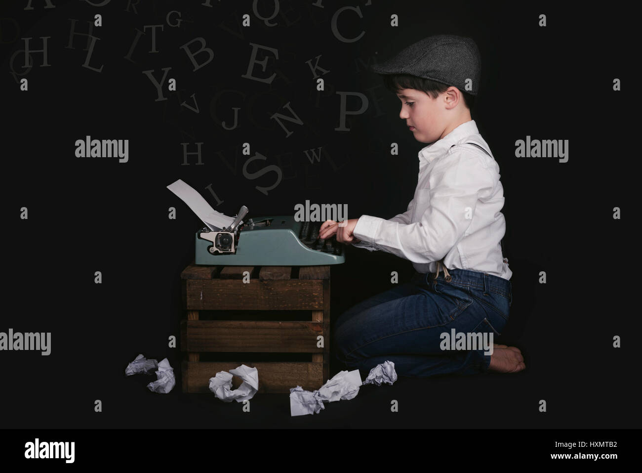 Boy typewriter hi-res stock photography and images - Alamy