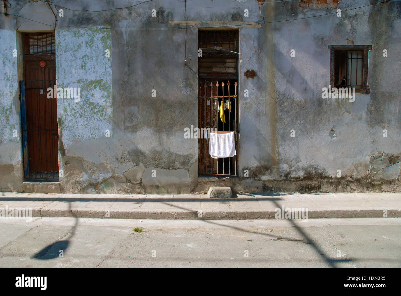 Washing hanging on iron front gate, Havana, Cuba Stock Photo - Alamy