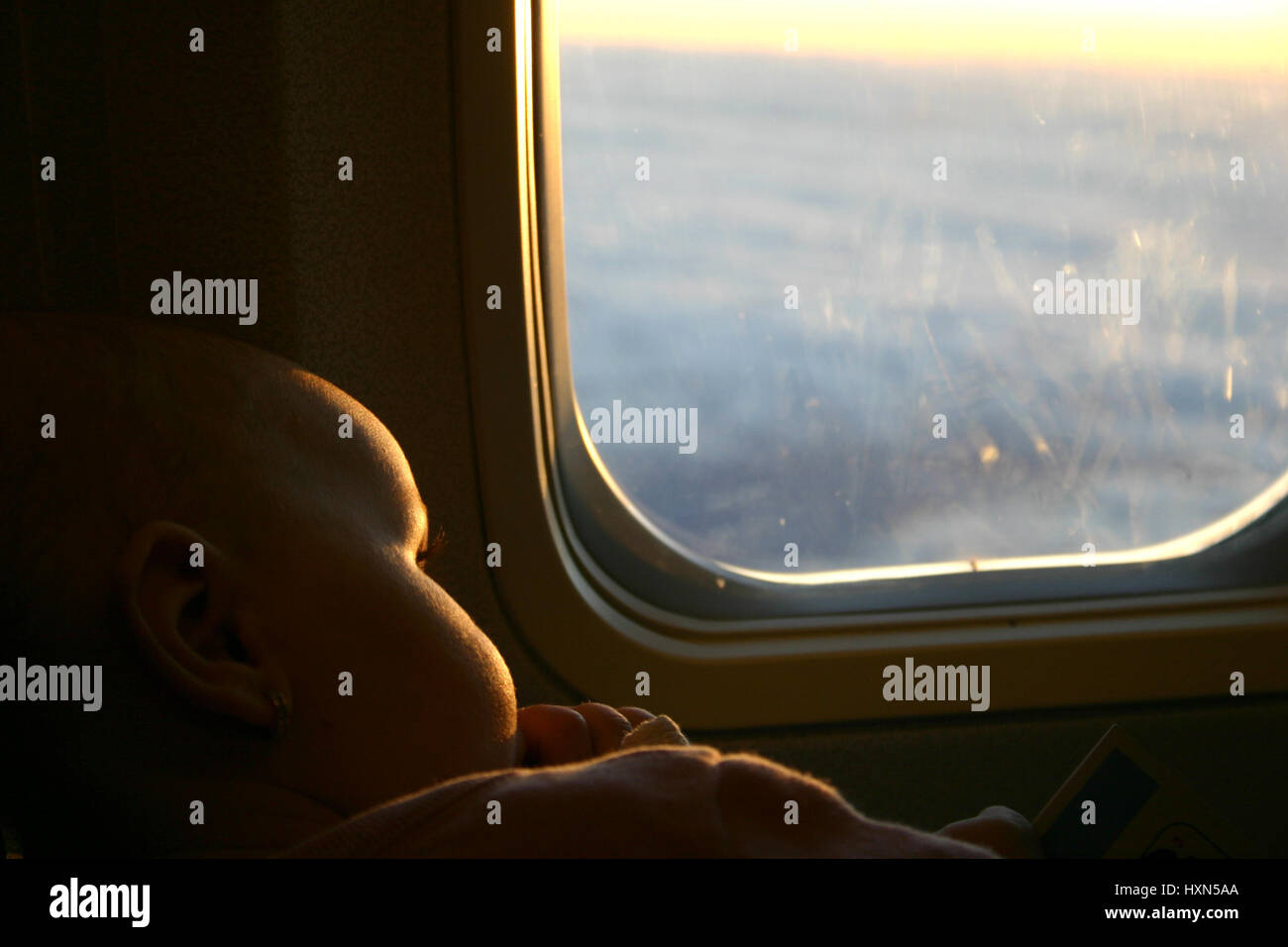 Child Looking Out Plane Window High Resolution Stock Photography and ...