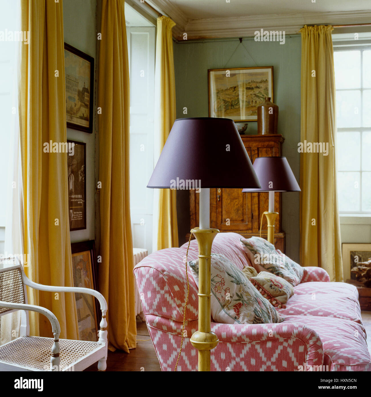 Living room with patterned sofa Stock Photo - Alamy