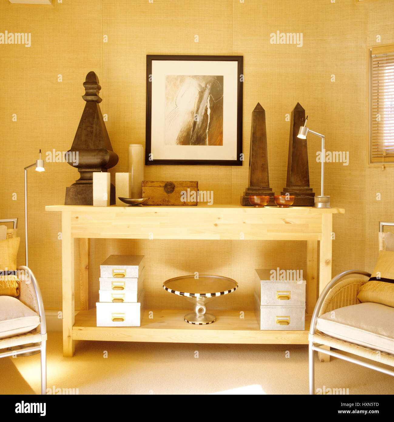 Console table between two armchairs Stock Photo - Alamy