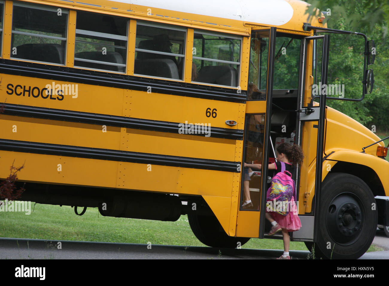 Child on school bus hi-res stock photography and images - Alamy