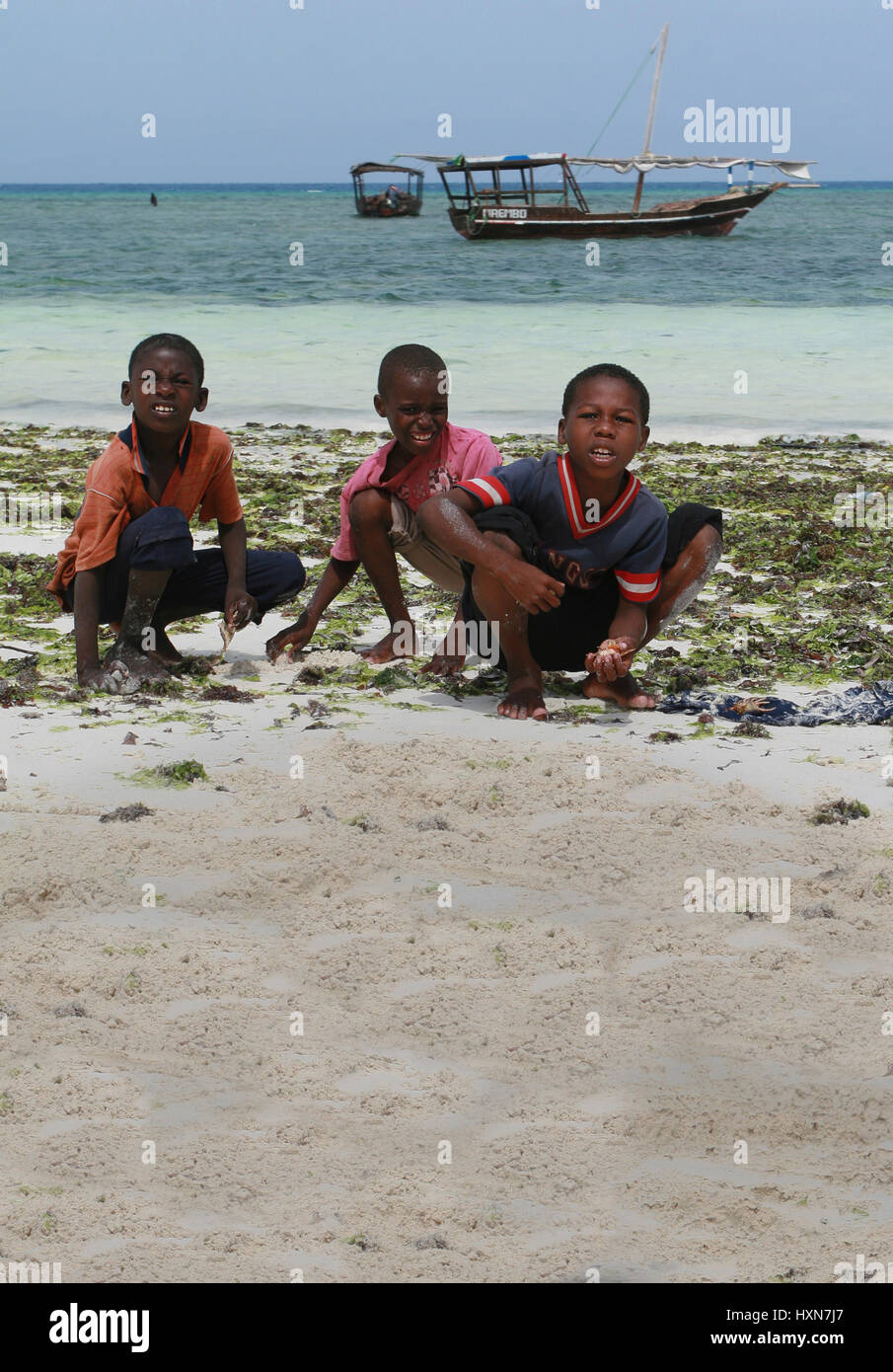 Zanzibar stone town young men hi-res stock photography and images - Alamy