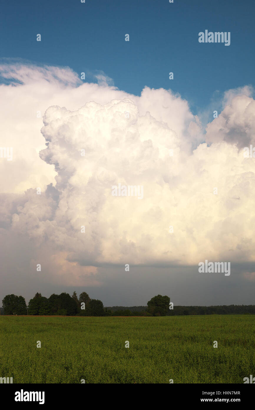 Big cloud over land Stock Photo - Alamy