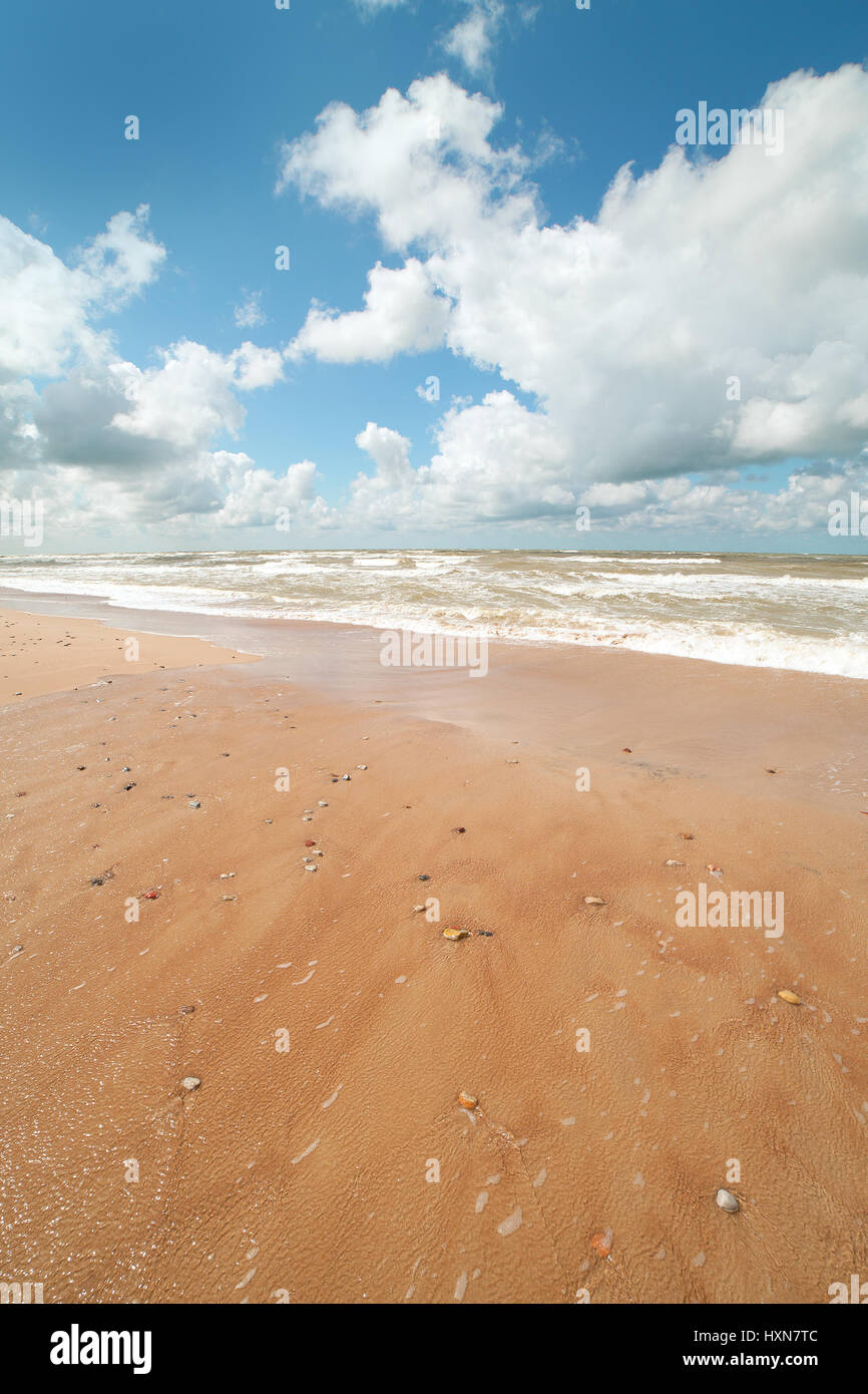 Waves on sand at Baltic sea coast Stock Photo - Alamy