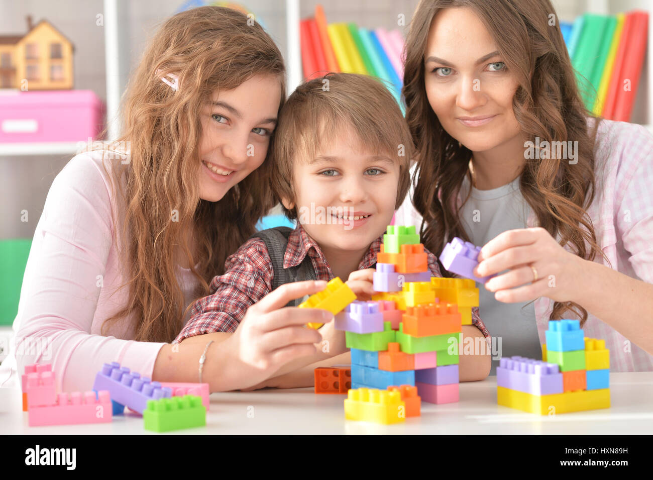 Family playing game Stock Photo - Alamy