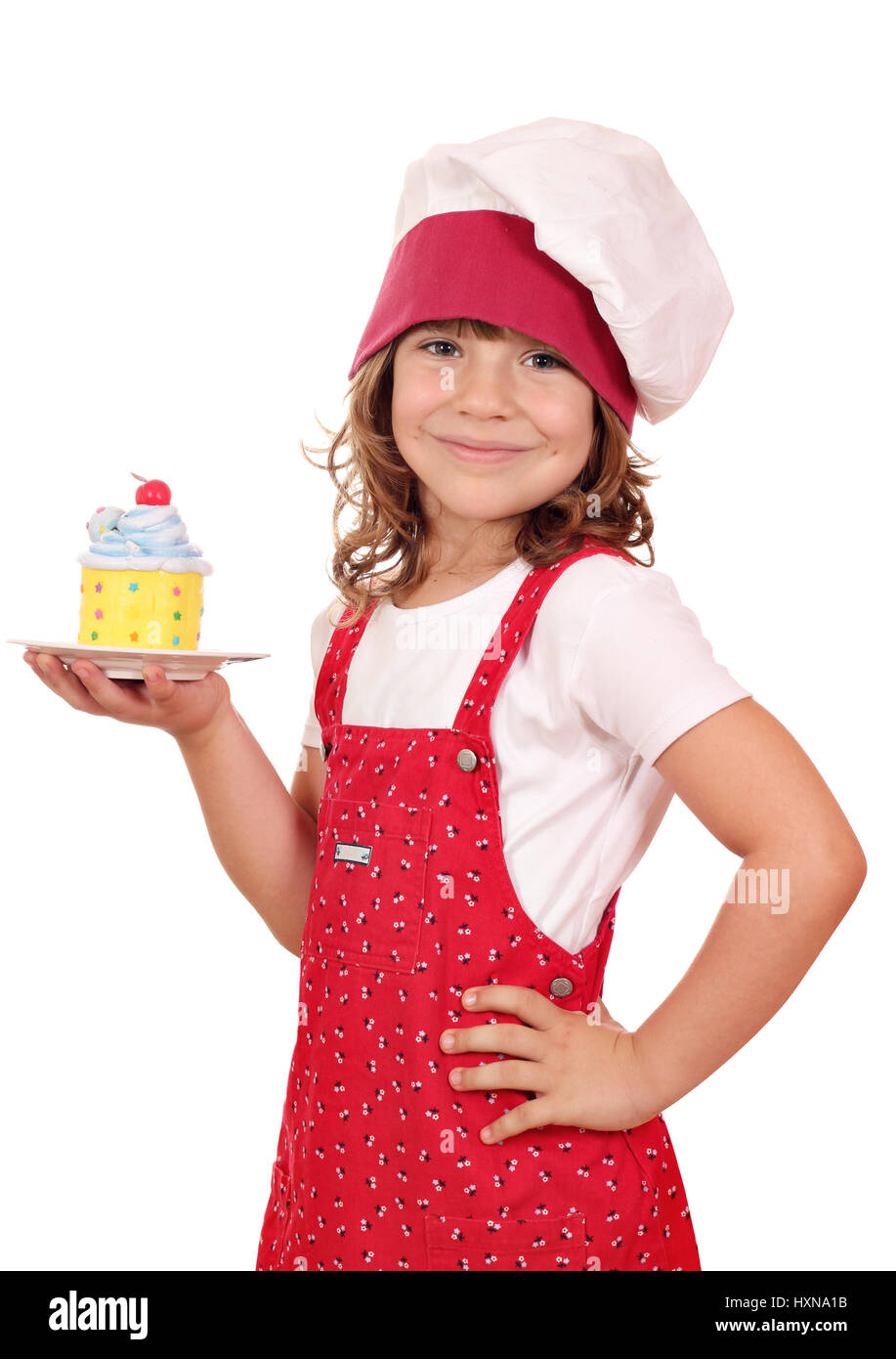 happy little girl cook with sweet colorful cupcake Stock Photo - Alamy