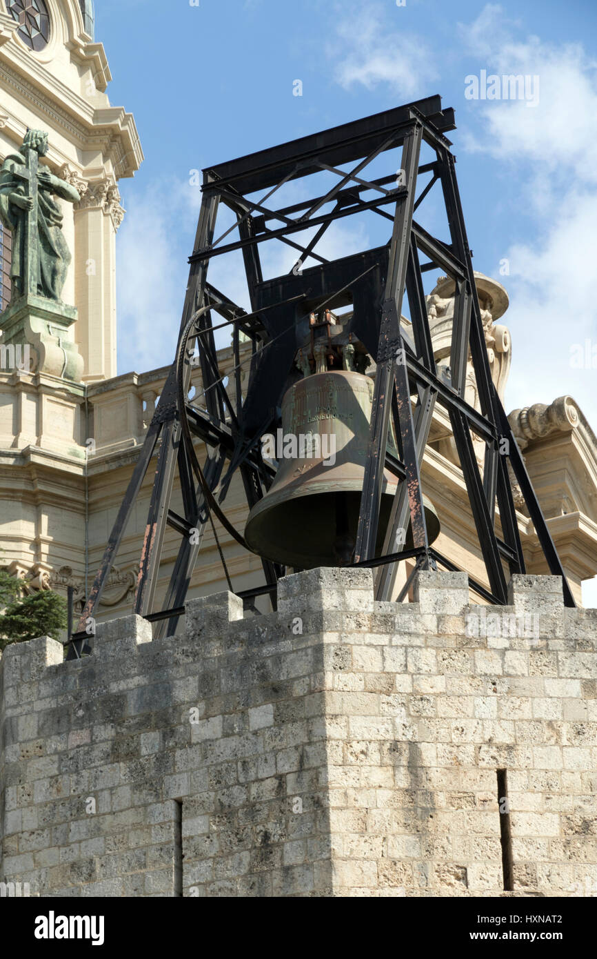 Bronze bell of the Church of Christ the King overlooking the city of ...