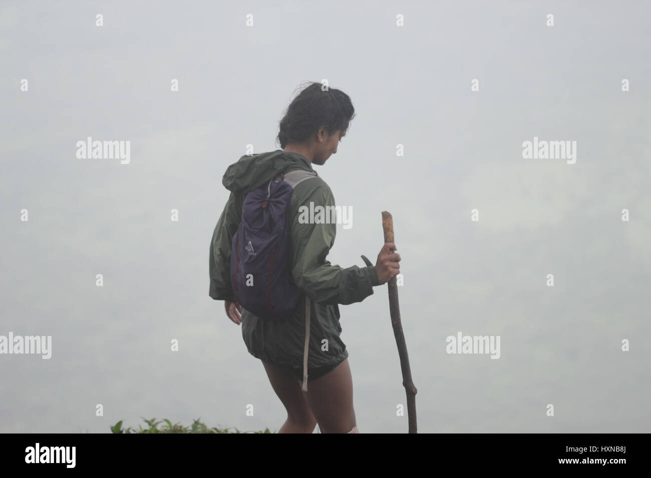 Person on a difficult and exhausting Hike to very high mountain Stock ...
