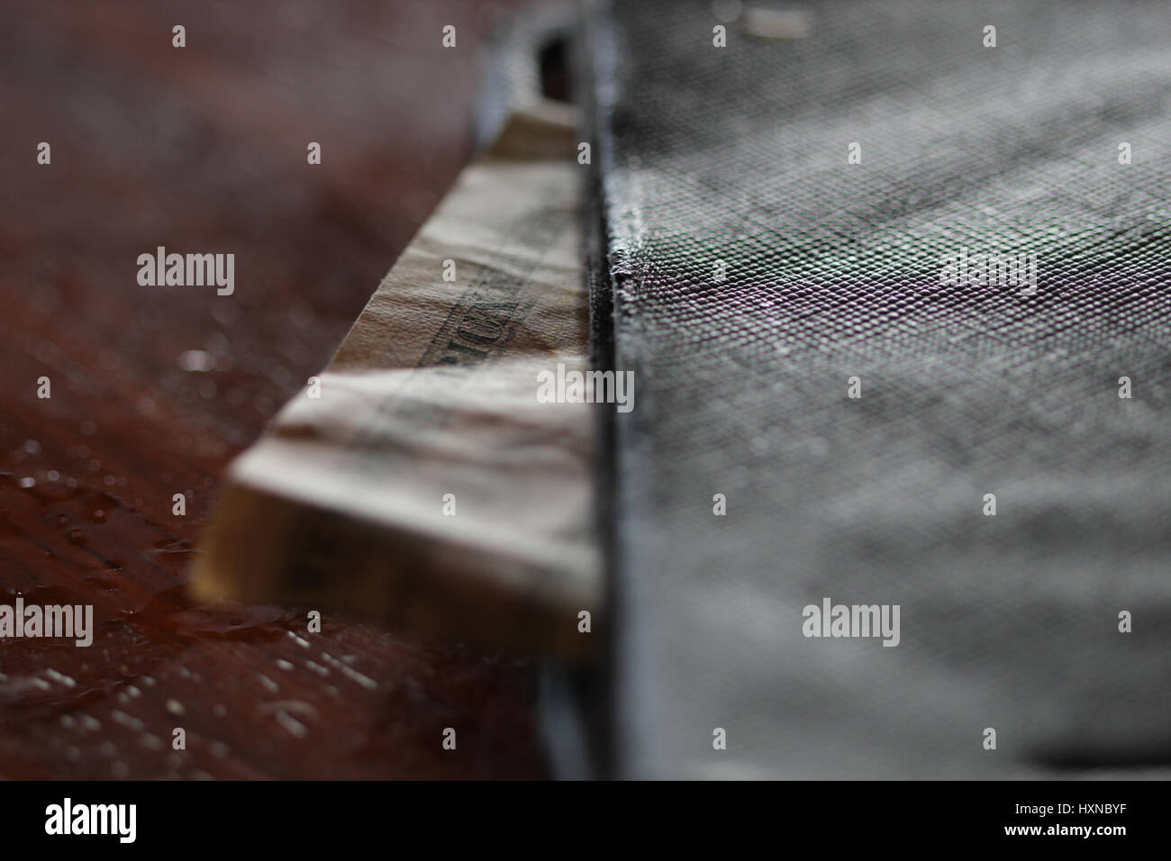 5 us dollar banknote inside the black old wallet Stock Photo - Alamy
