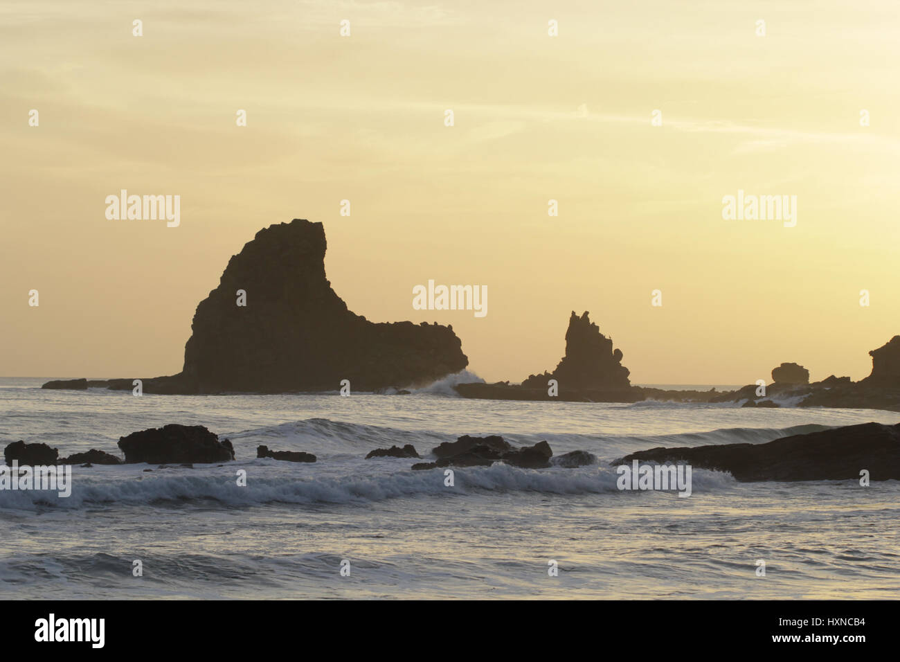 Golden yellow sky during sunset over the water in ocean Stock Photo - Alamy