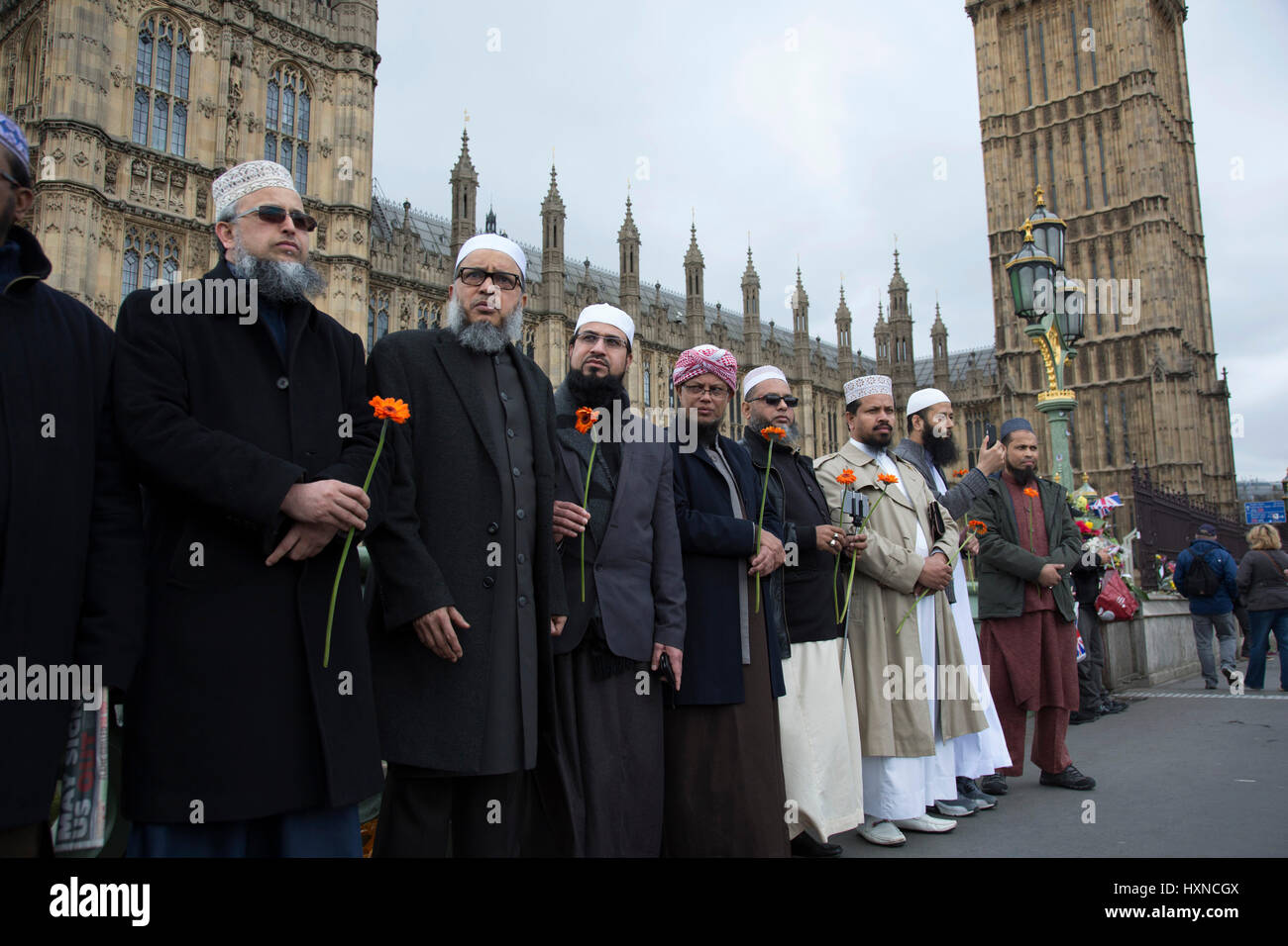 Thousands of people including police officers and Muslim faith leaders ...