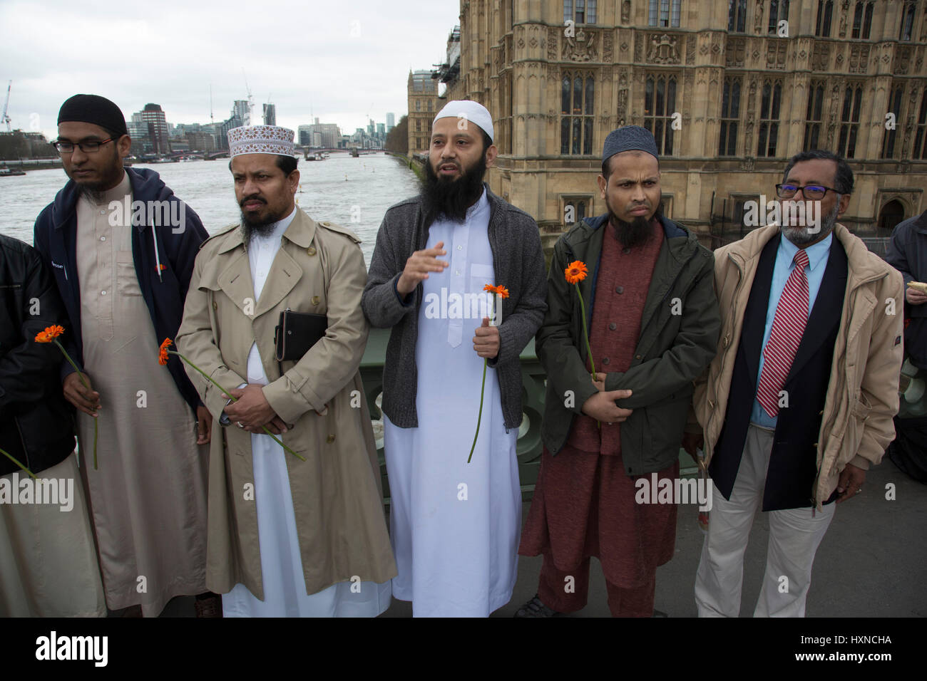 Thousands of people including police officers and Muslim faith leaders ...