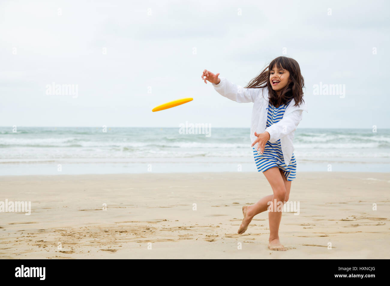 Girl And Frisbee High Resolution Stock Photography and Images - Alamy