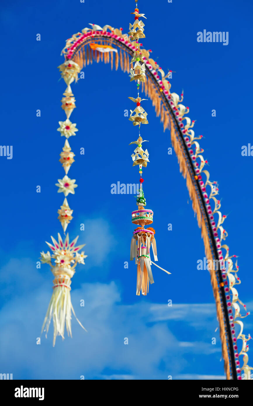 Traditional Bali Penjor, bamboo pole with decoration on village street ...