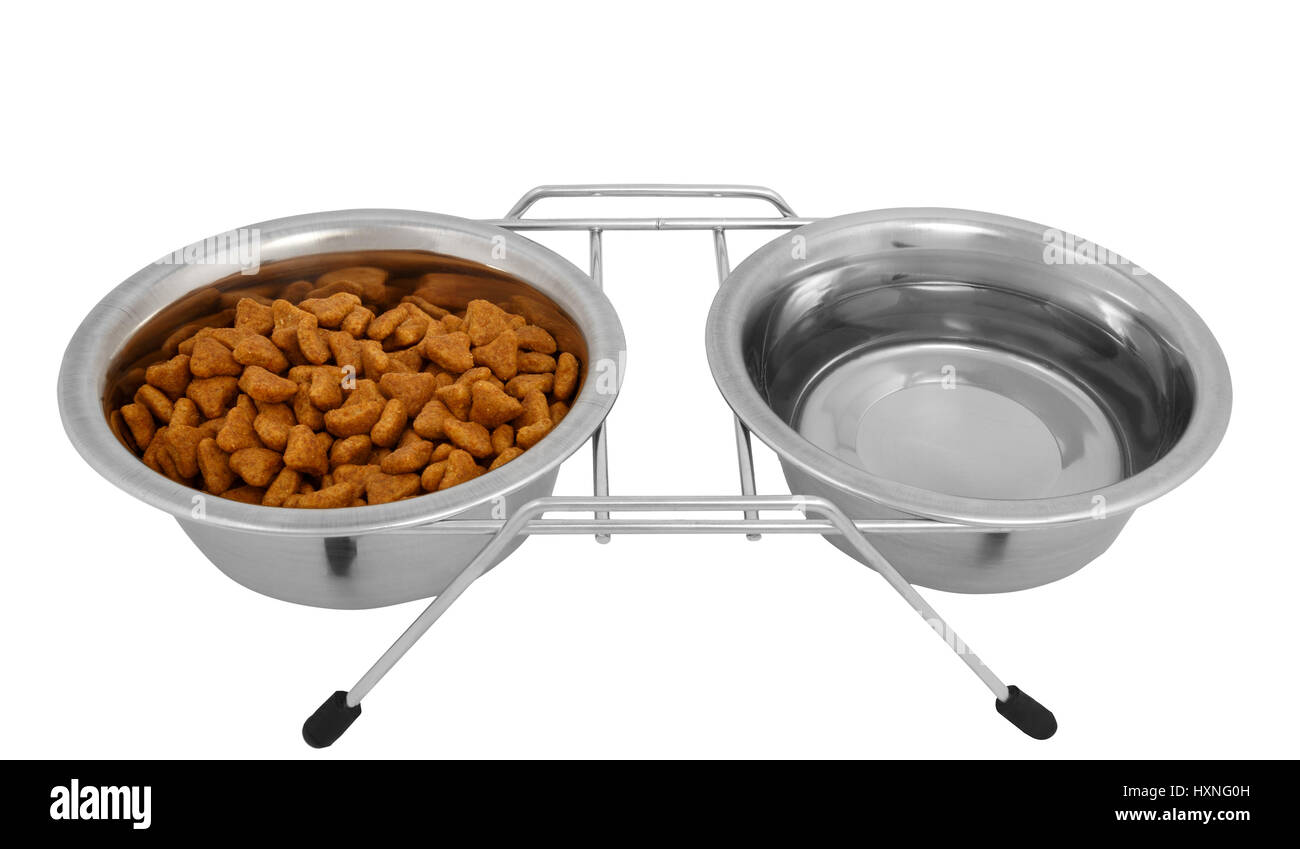 Two metal bowls for dogs or cats with food and water isolated on white ...