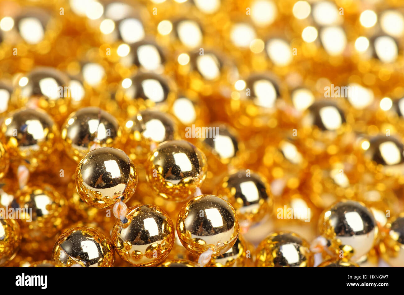 Many little golden balls Stock Photo - Alamy
