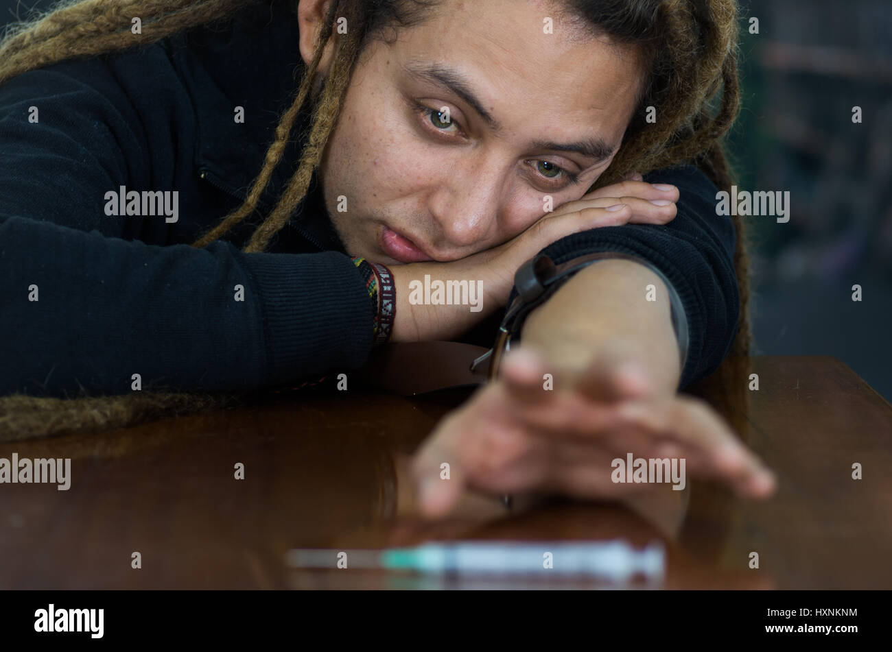 Reaching across table hi-res stock photography and images - Alamy