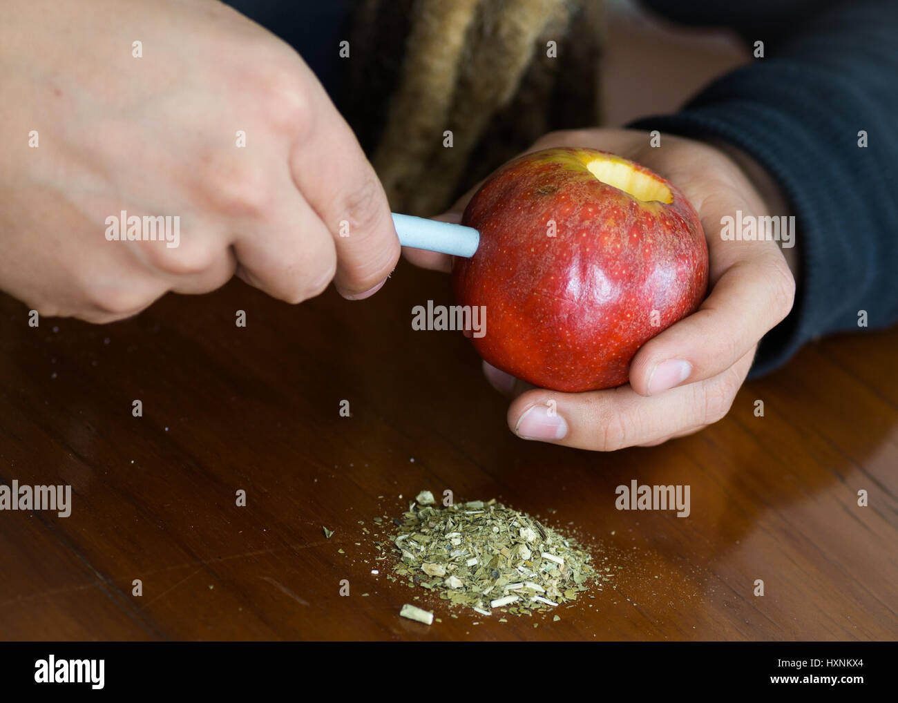 Man creating apple bong using hi-res stock photography and images - Alamy