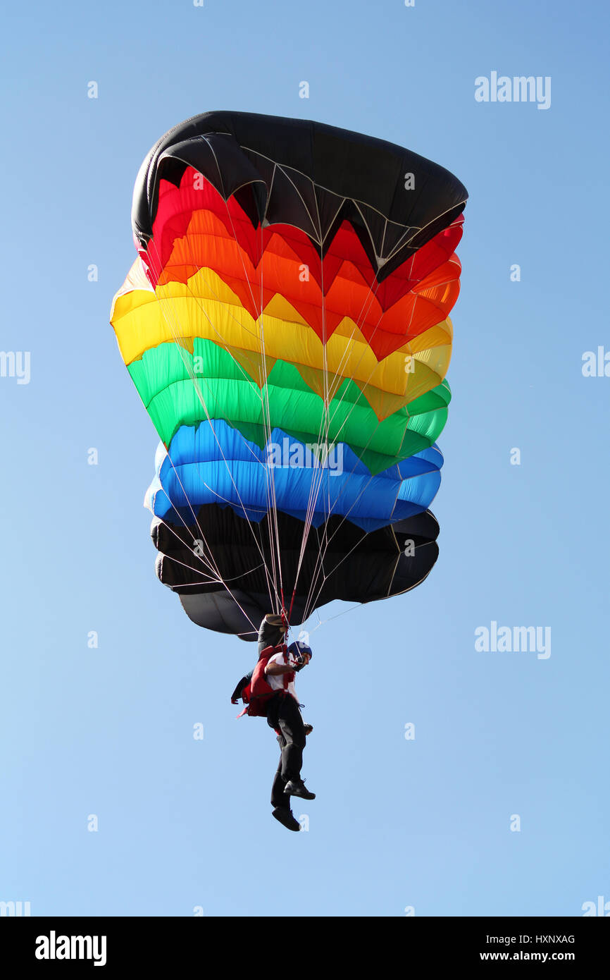 parachutist with colorful parachute extreme sport Stock Photo - Alamy