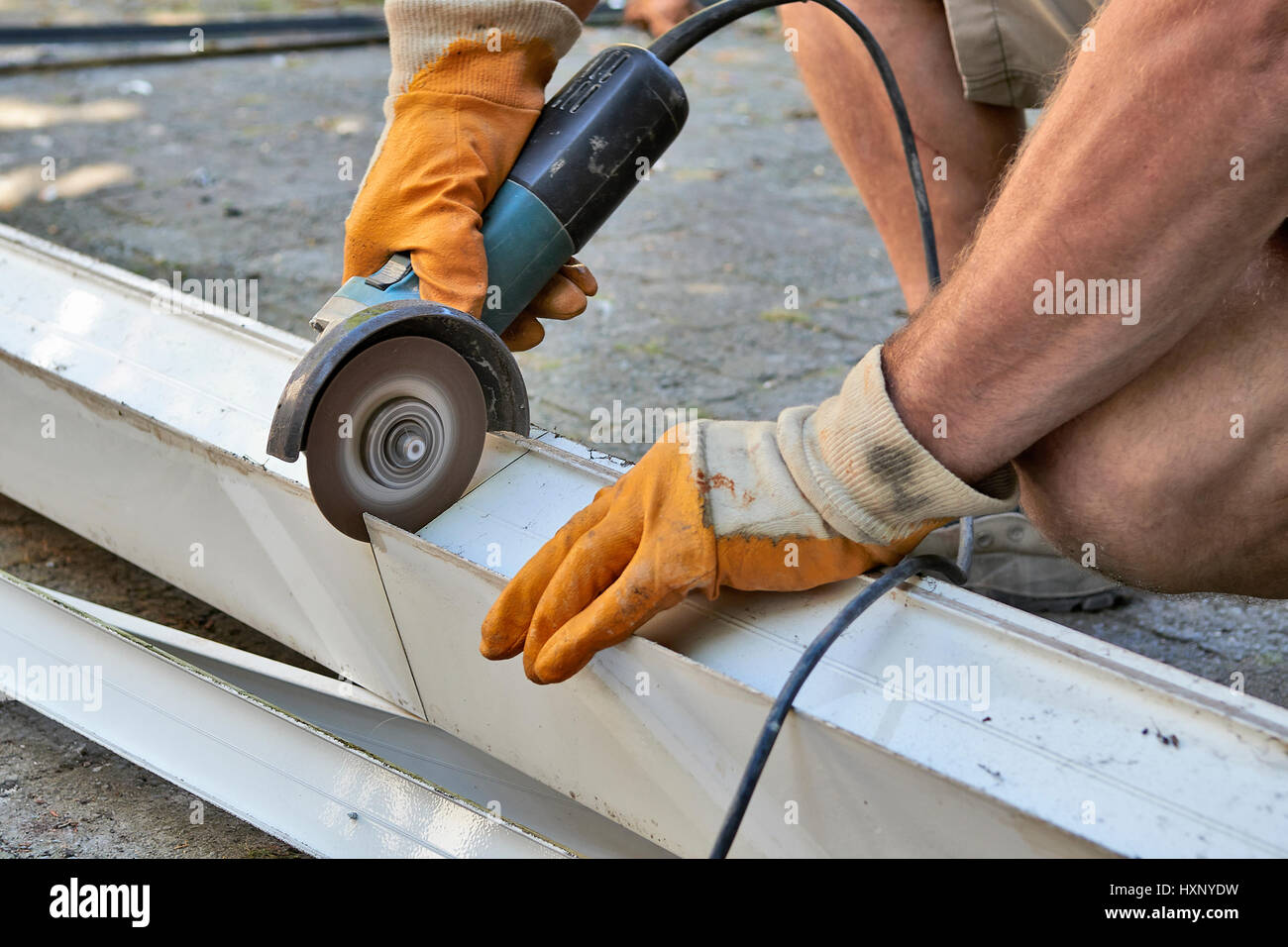 Construction worker using light hi-res stock photography and images - Alamy