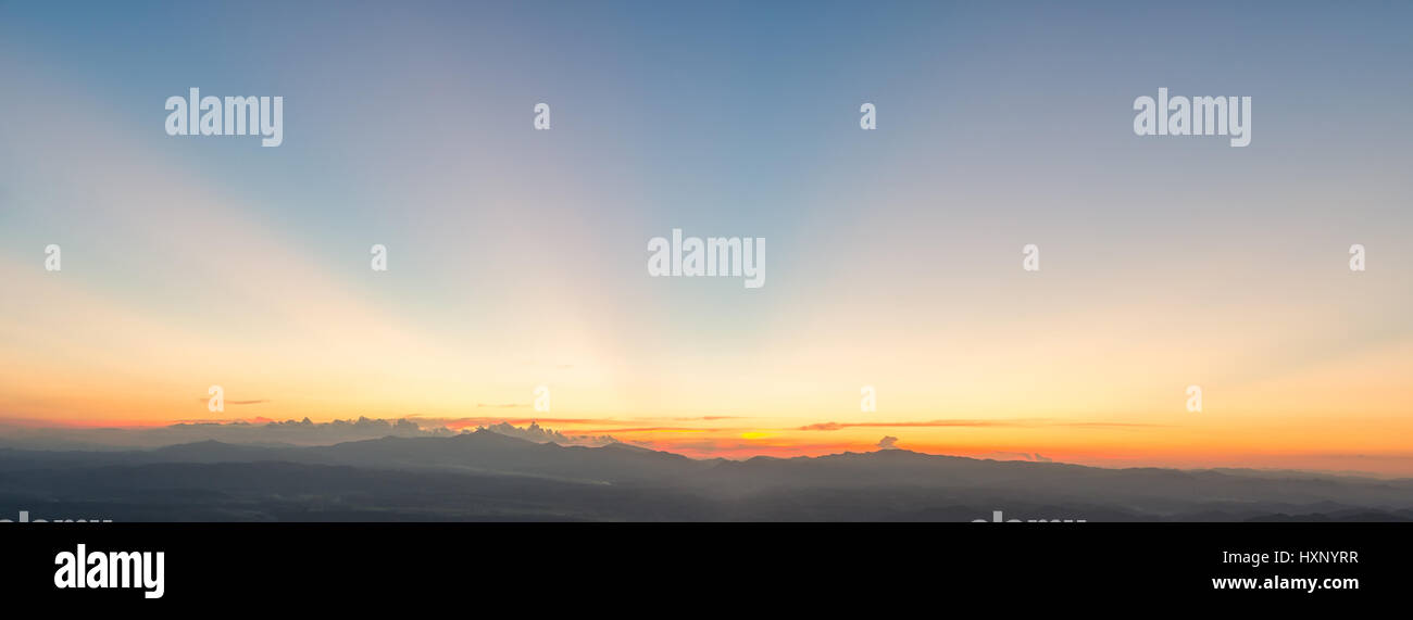 Sun beam and sunset sky Stock Photo - Alamy