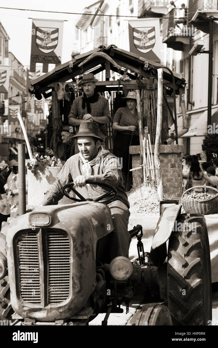 Mom driving the tractor, rural scene Stock Photo - Alamy