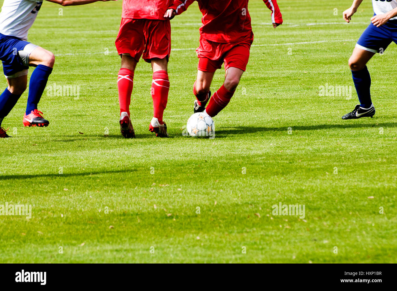 Football players legs hi-res stock photography and images - Alamy