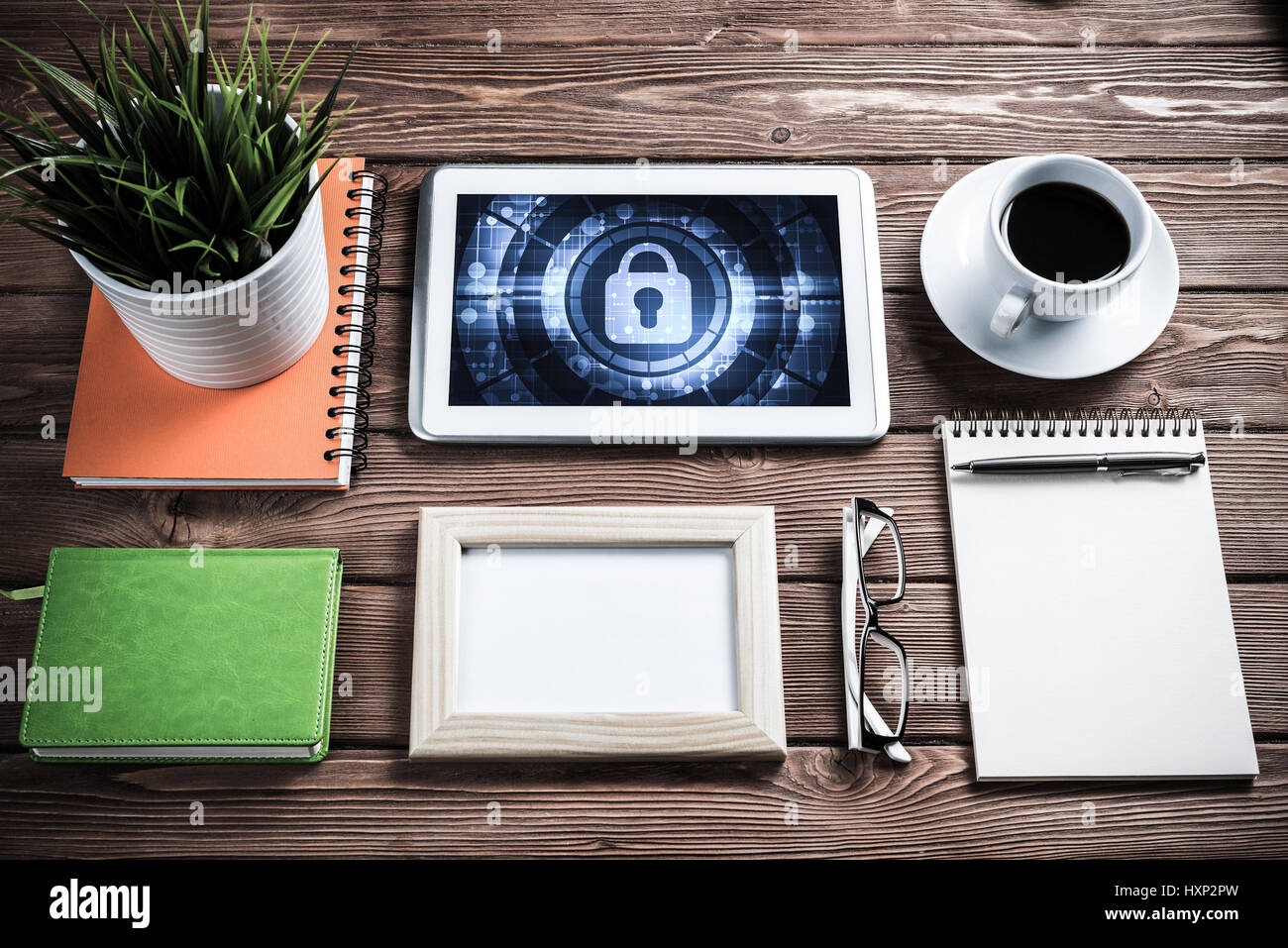 Web security and technology concept with tablet pc on wooden tab Stock ...